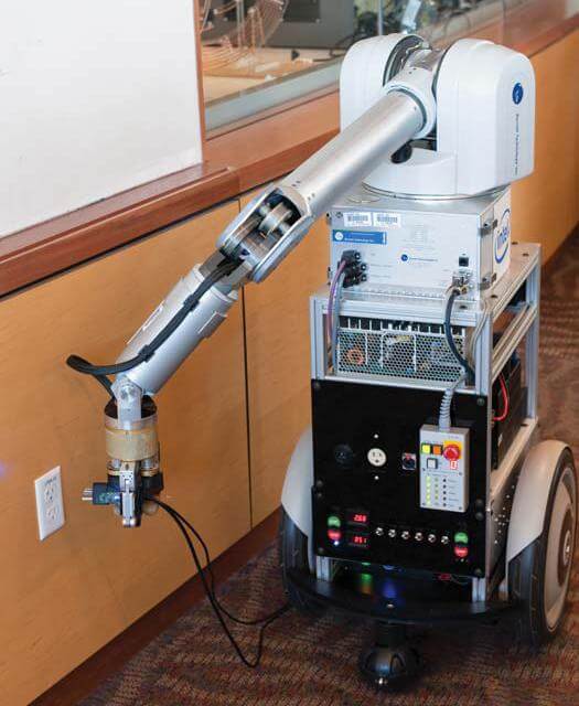 Intel Robot Senses Wall Outlet, Plugs Itself In