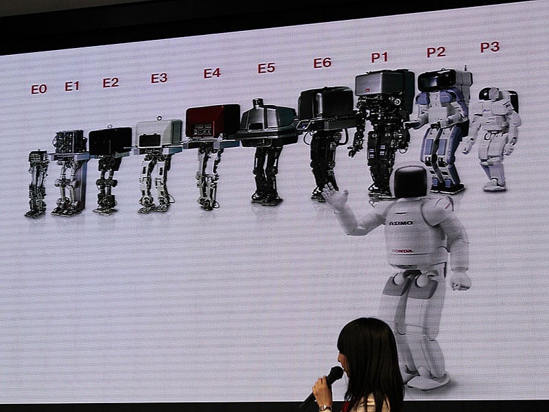 Honda's ASIMO Turns 9, Celebrates With Cardboard Cake